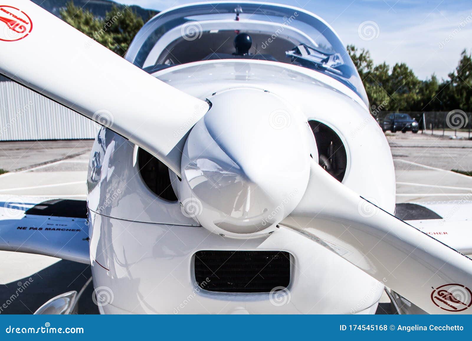White Twoseater Aircraft Propeller And Cockpit Front Close-up View ...
