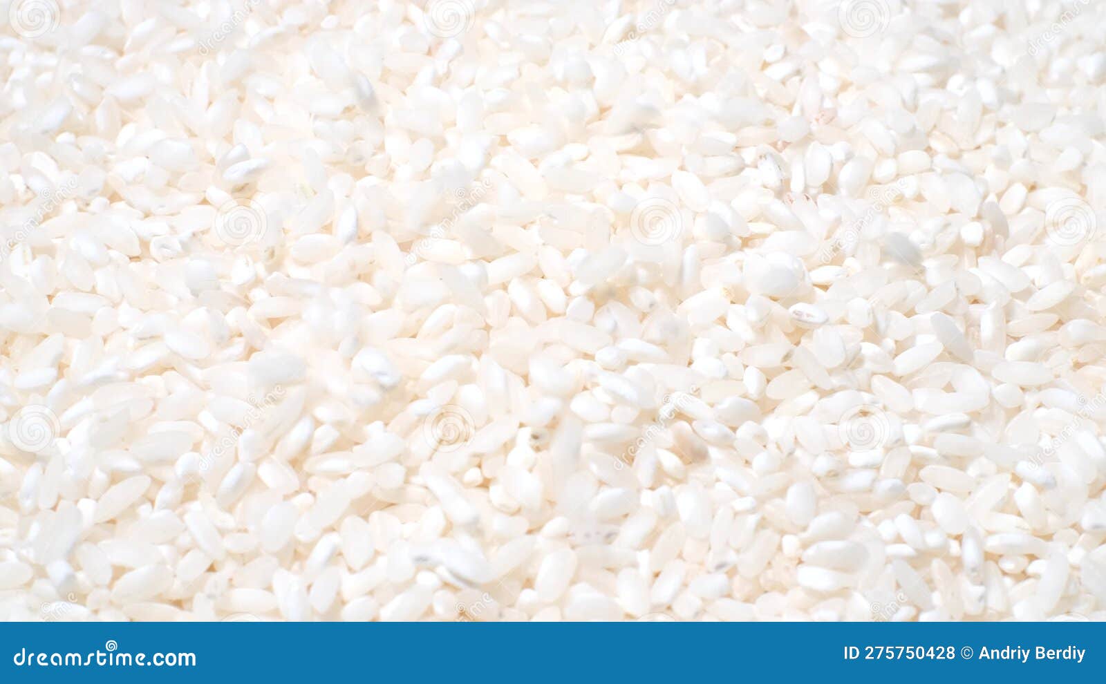 White Uncooked Rice Crumbles and Rotates in a Circle. Cooking in China ...