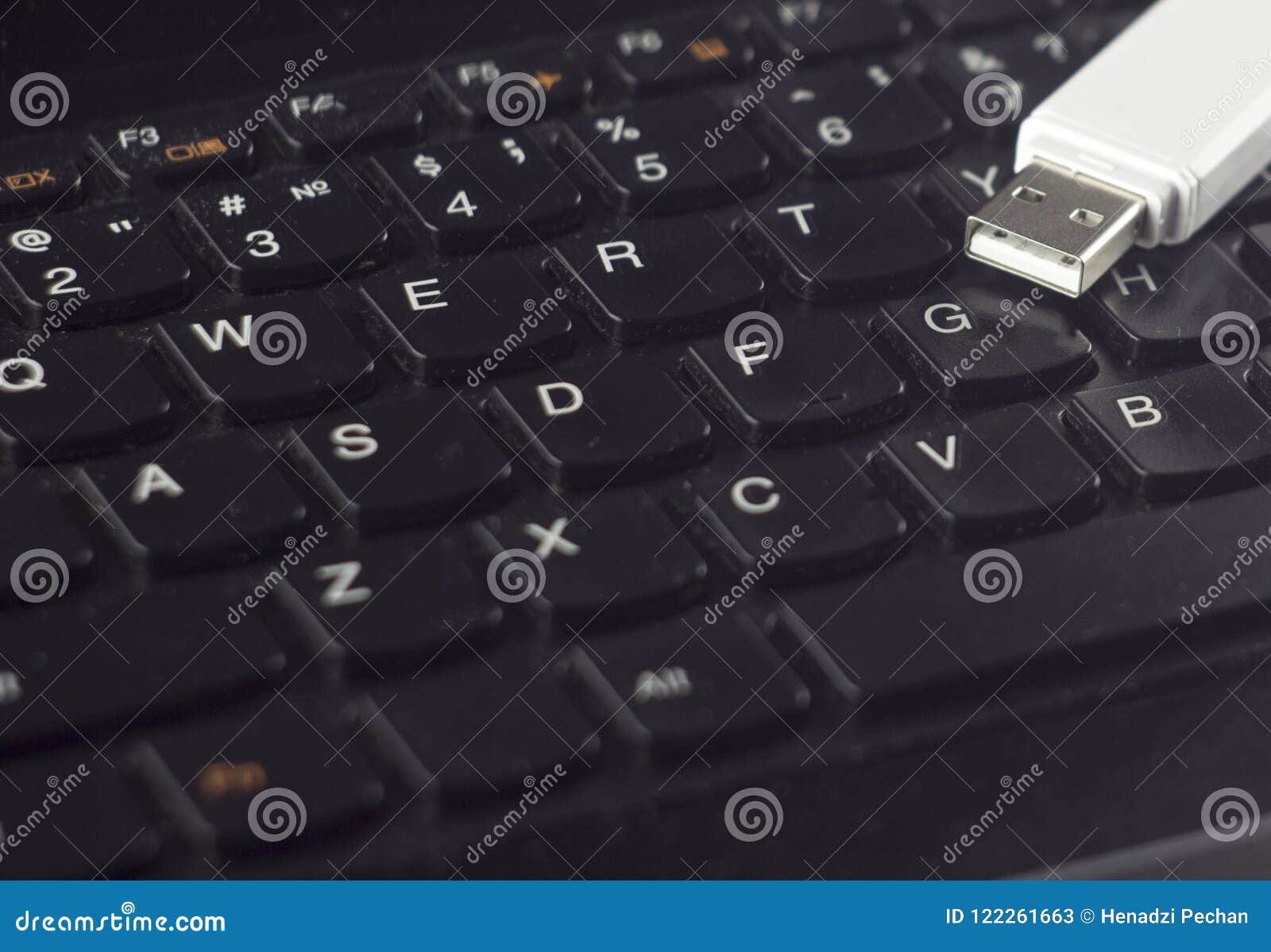 White USB Flash Drive on a Black Keyboard Usb Stock Image - Image of ...