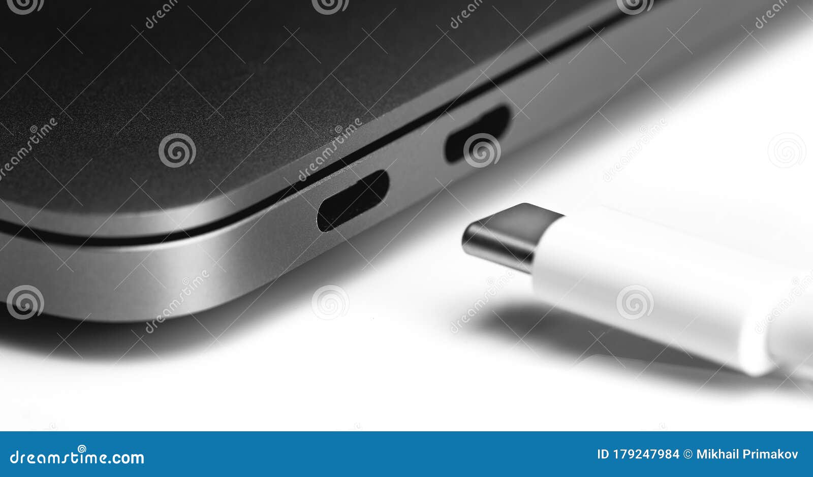 White USB Type-C Cable with Notebook USB C Ports Closeup on Stock Photo ...