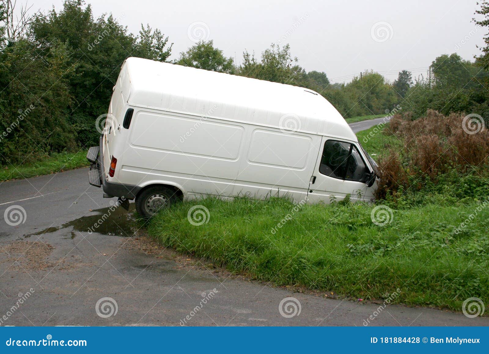 A White Van Crashed into a Ditch Stock Photo - Image of vehicles ...