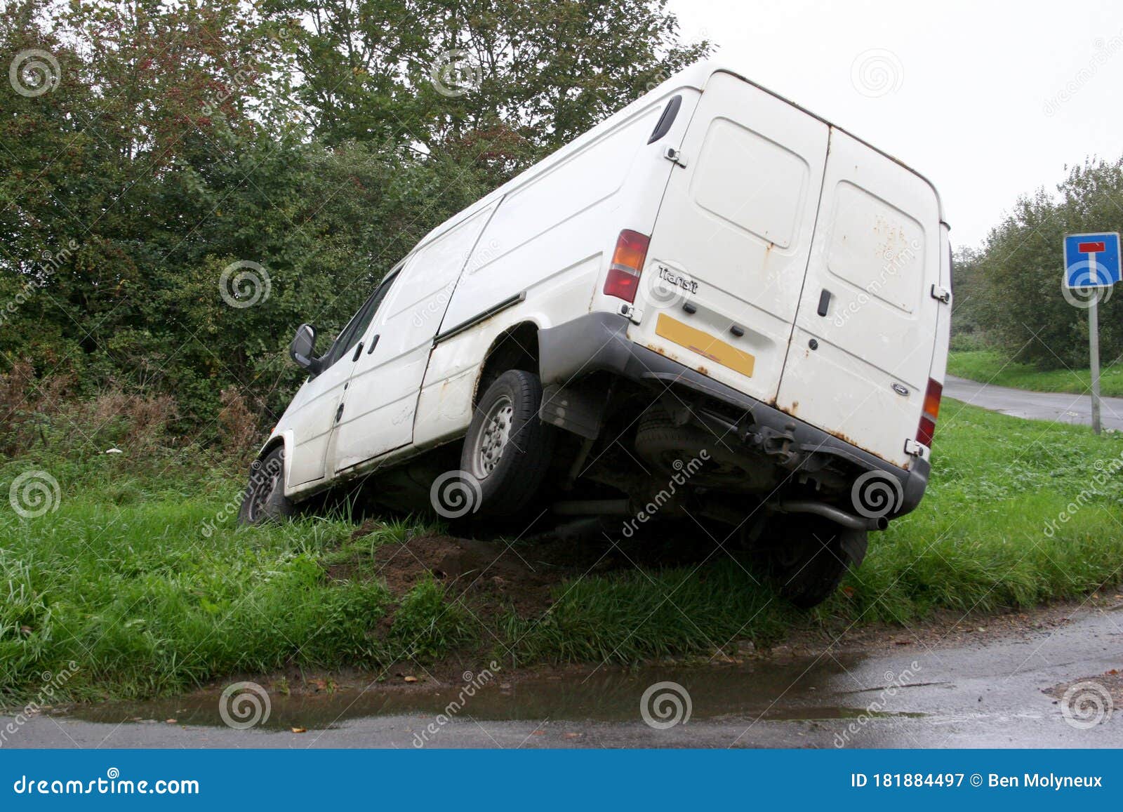 A White Van Crashed into a Ditch Editorial Photography - Image of ...