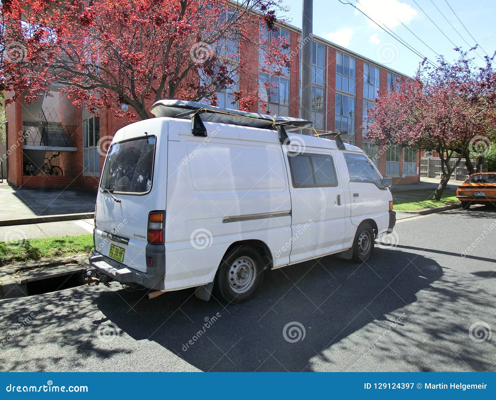 White Van Parking Under a Tree in Autumn Editorial Photography - Image ...