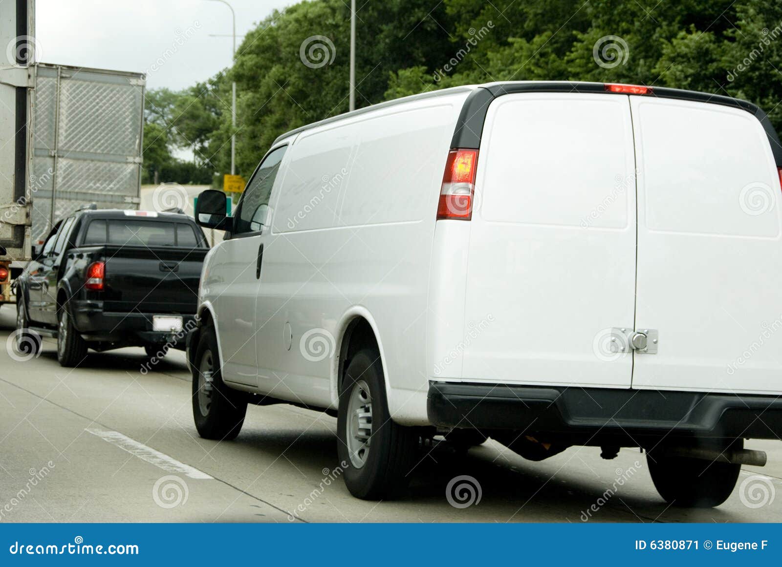 White van in traffic stock image. Image of traffic, transportation ...