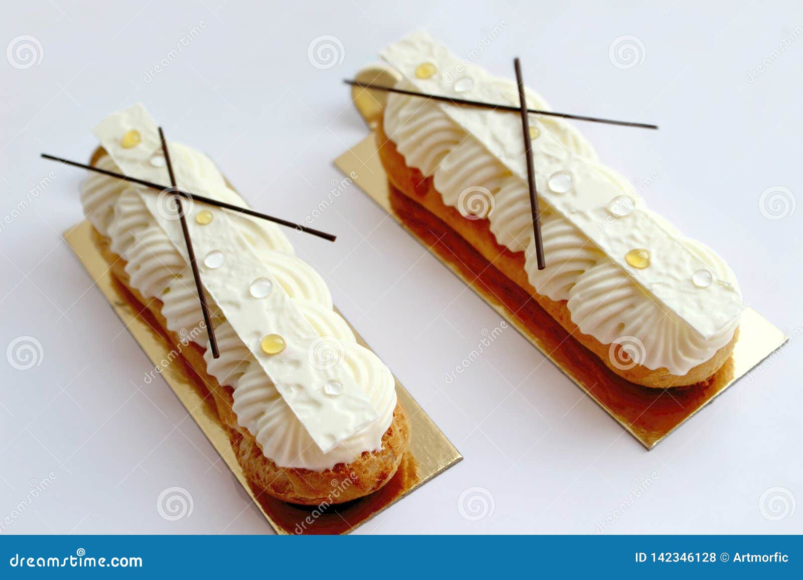 White Vanilla Eclairs with Decorations Stock Photo - Image of delicious ...