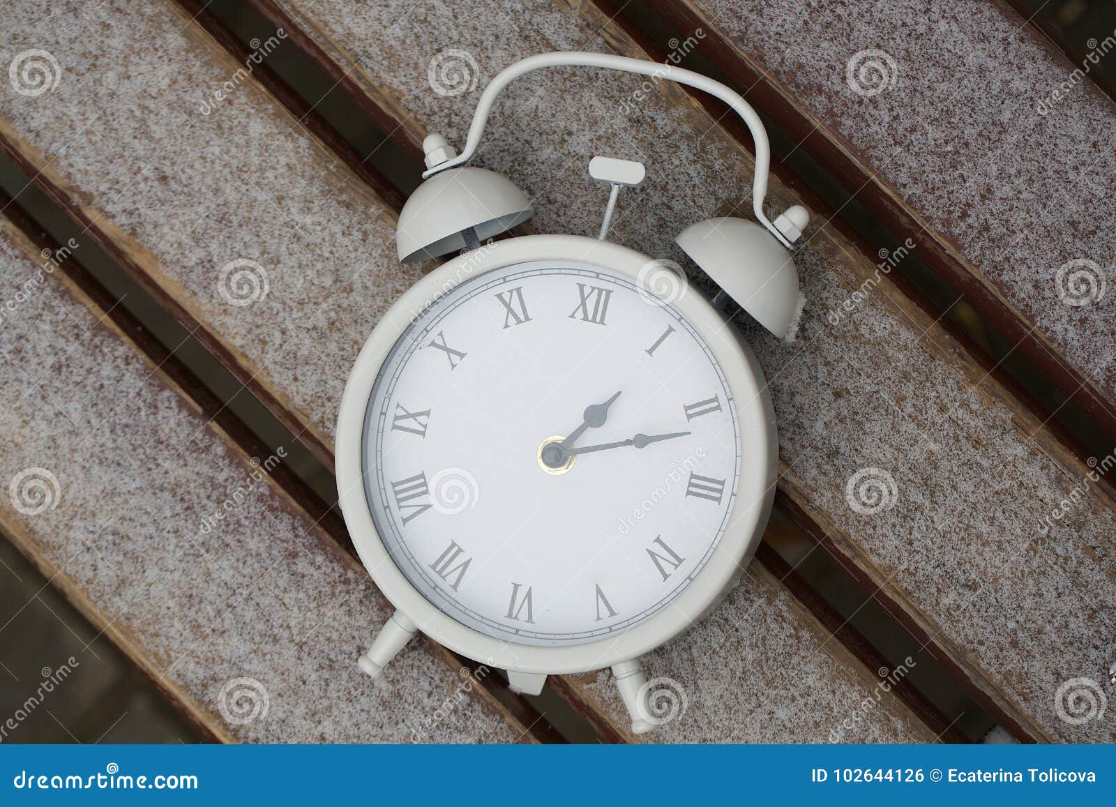 Vintage clock on a bench stock photo. Image of forward - 102644126