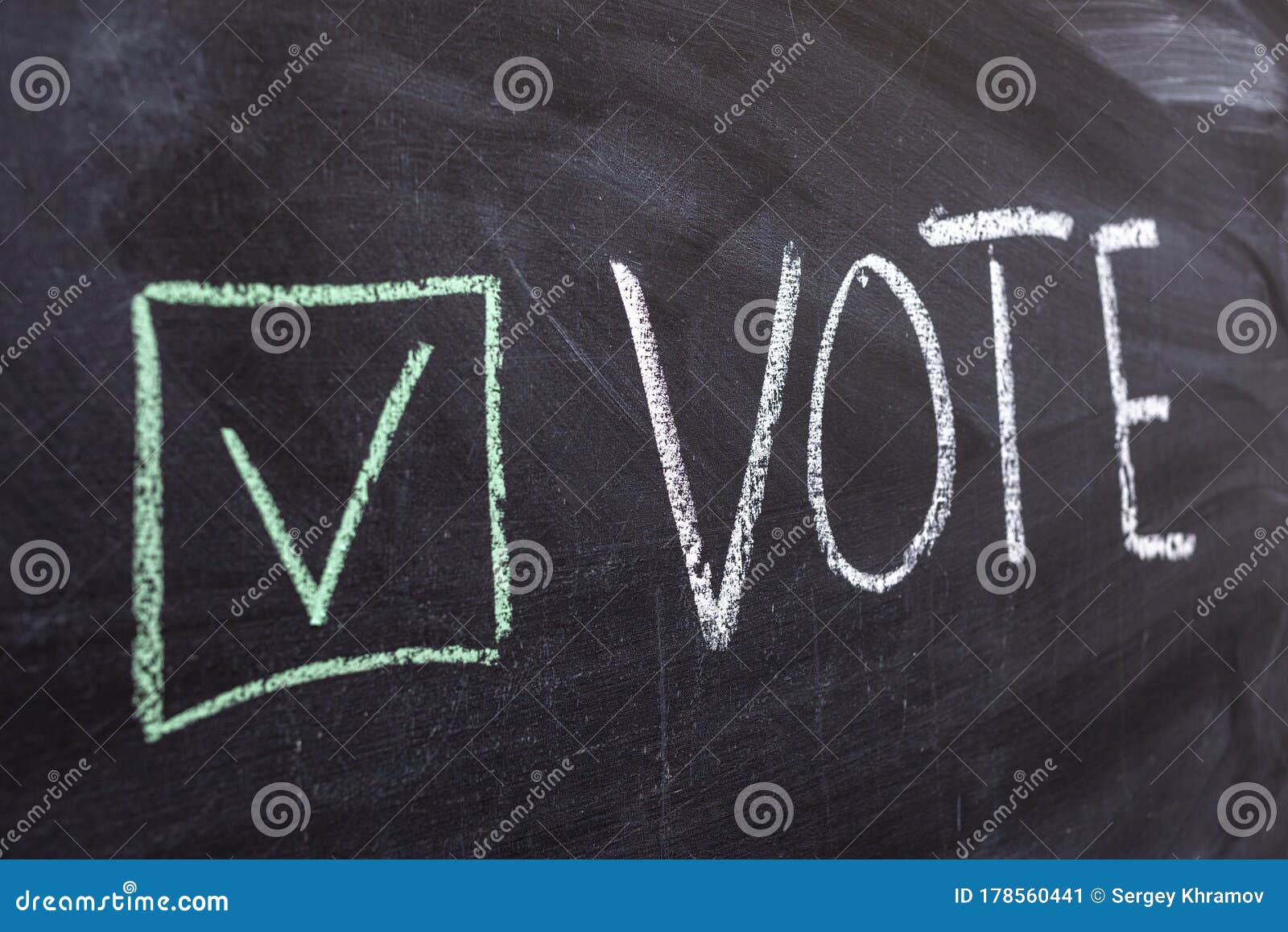 White Vote Lettering Near Check Mark on Black Chalkboard Stock Image ...