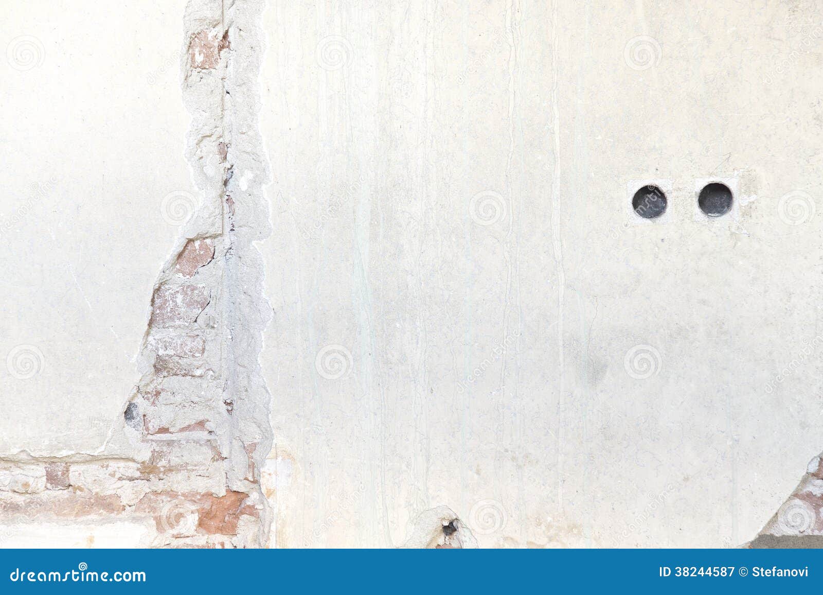 White Wall with Holes and Crack Where You Can See the Bricks Stock ...