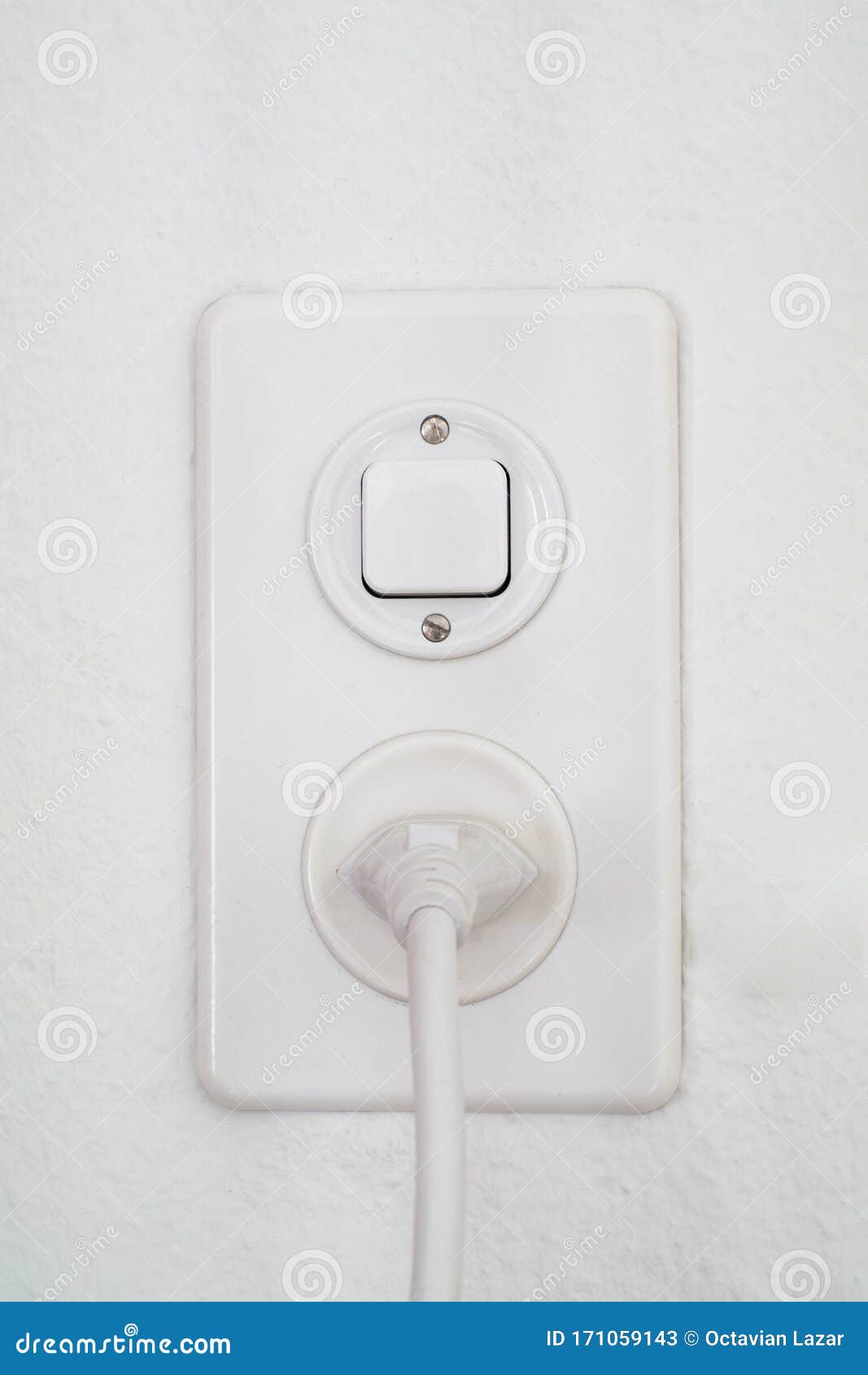 White Wall Mounted Electricity Plug and Light Switch Close Up Shot ...