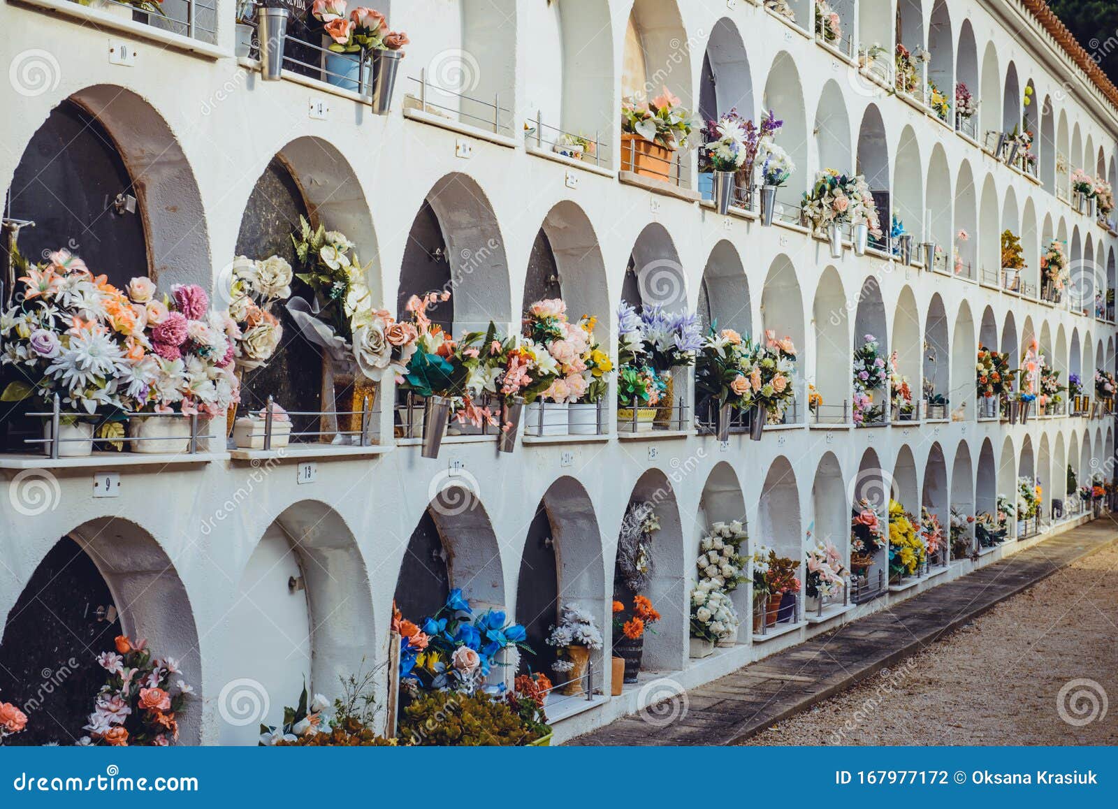 White Wall with Rows of No Name Numbered Burial Cells with Artificial ...