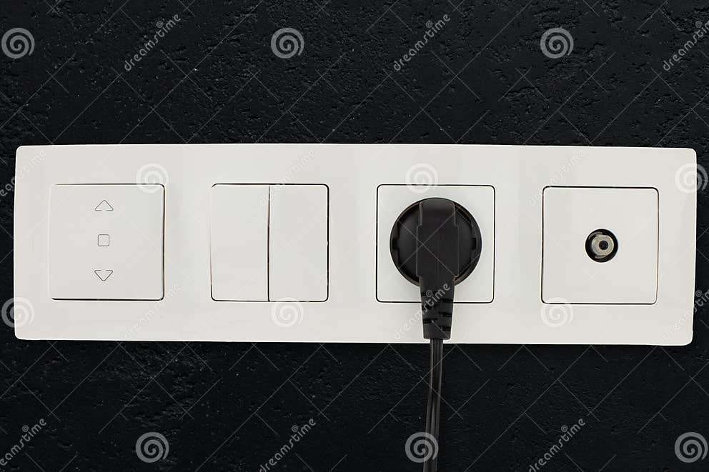 White Wall Socket with Plug Stock Photo - Image of safety, wall: 323322132