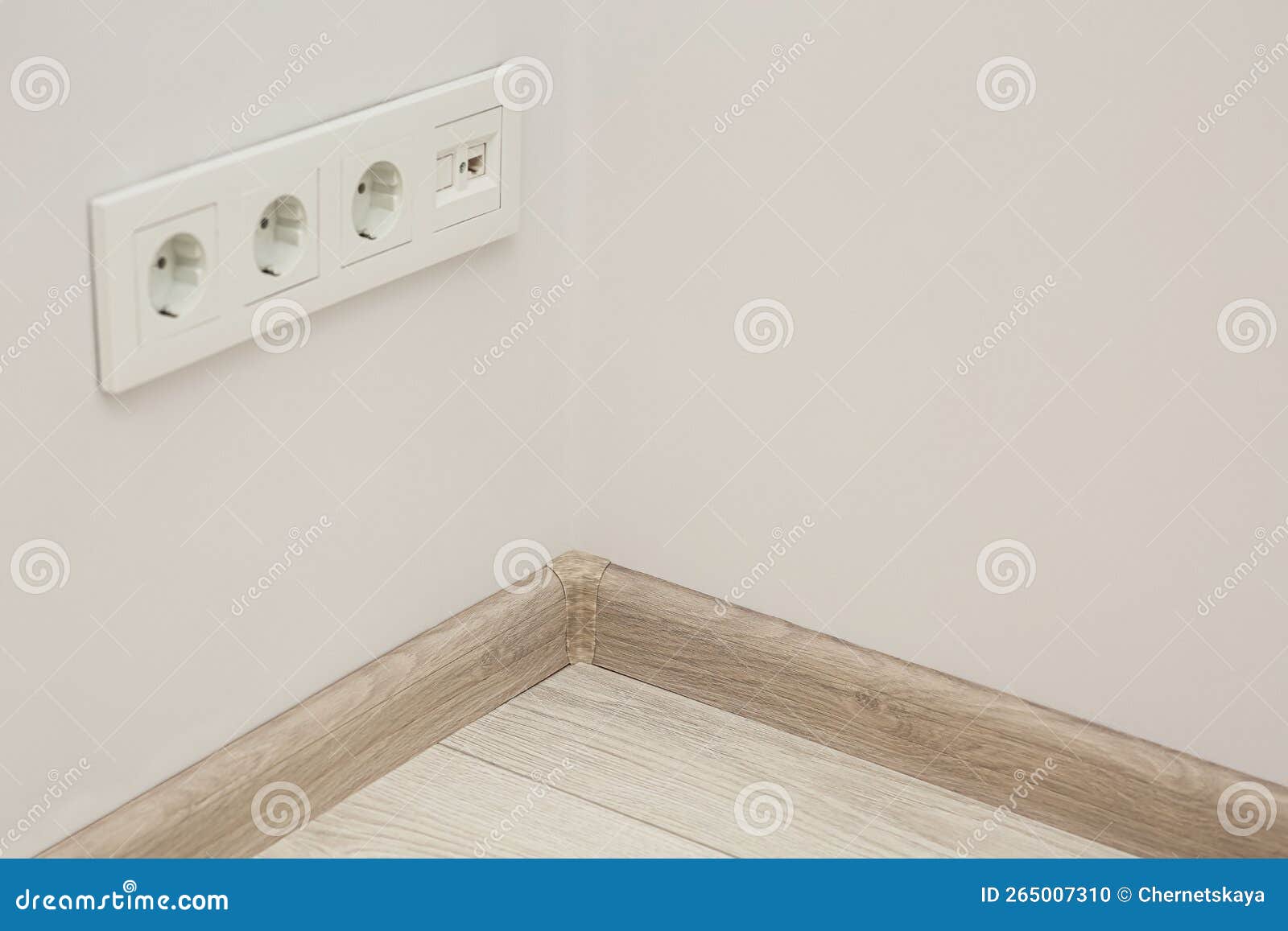 White Wall with Sockets and Baseboard Indoors, Space for Text Stock ...
