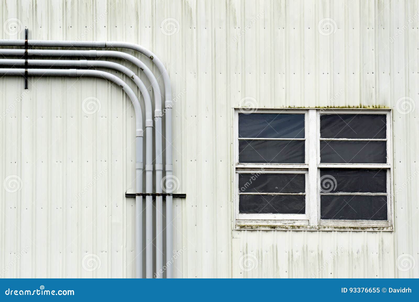 White Wall with Windows and Conduits Stock Image - Image of white ...
