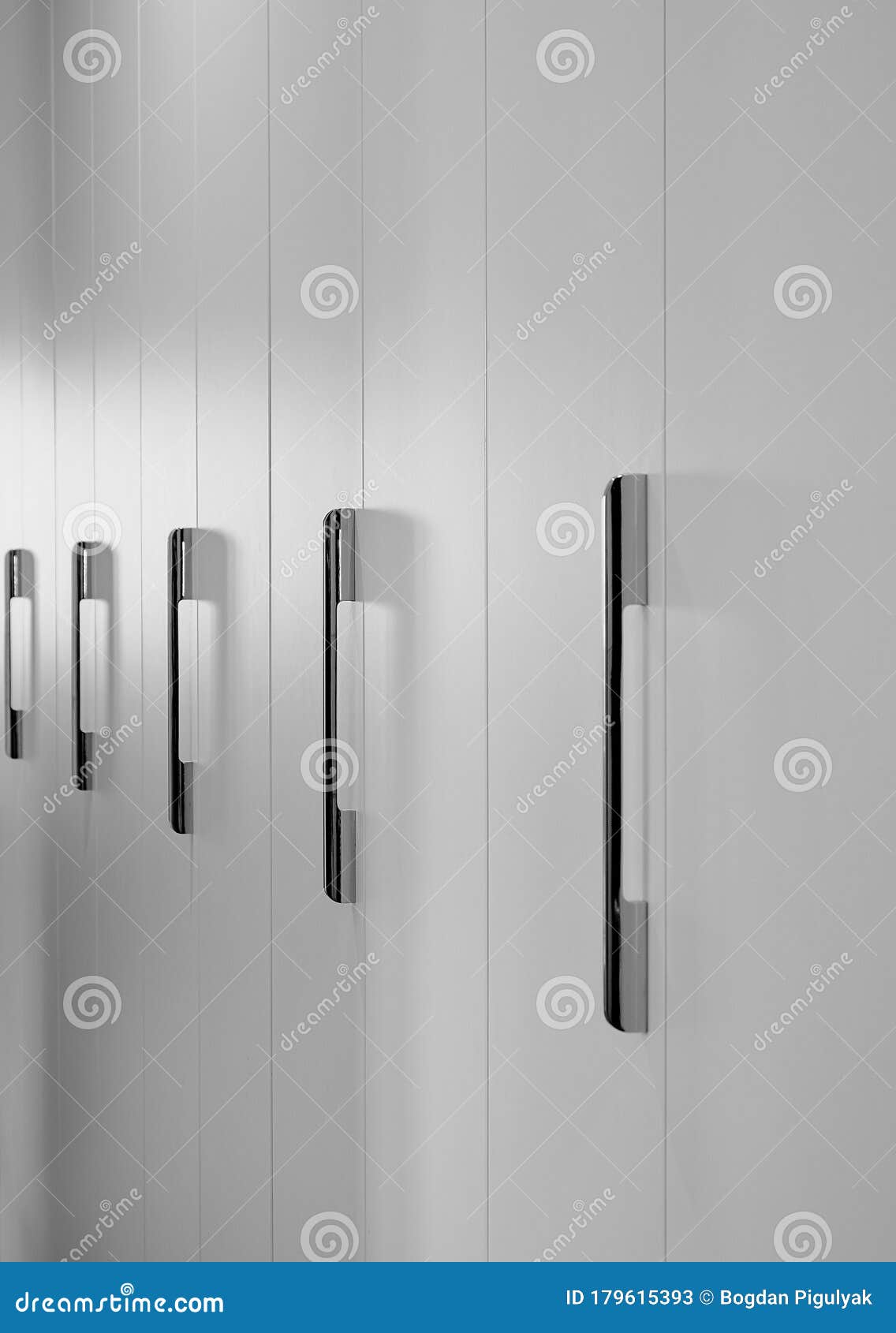 White Wardrobe with Metal Shiny Handles Stock Image - Image of hall ...