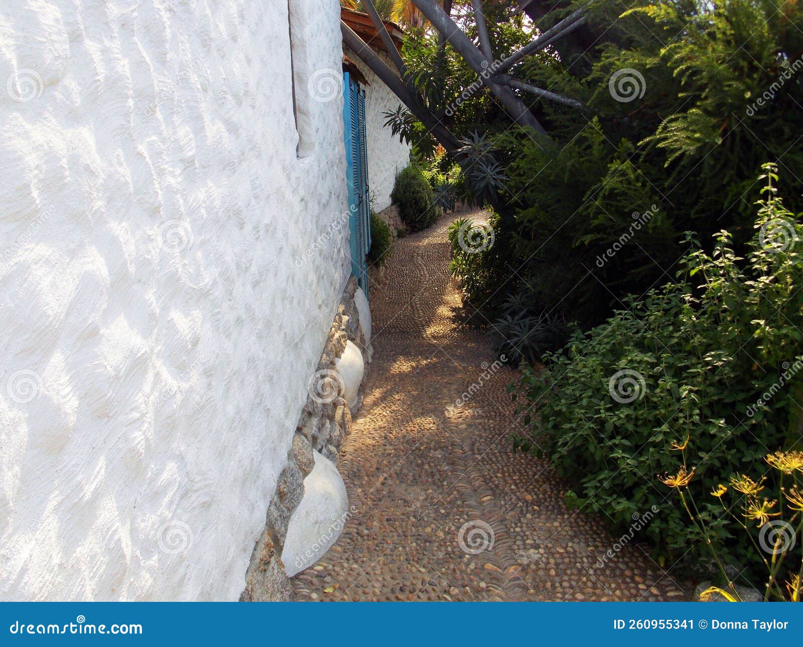 White Washed Stone Walls and Pebble Paths. Stock Image - Image of path ...