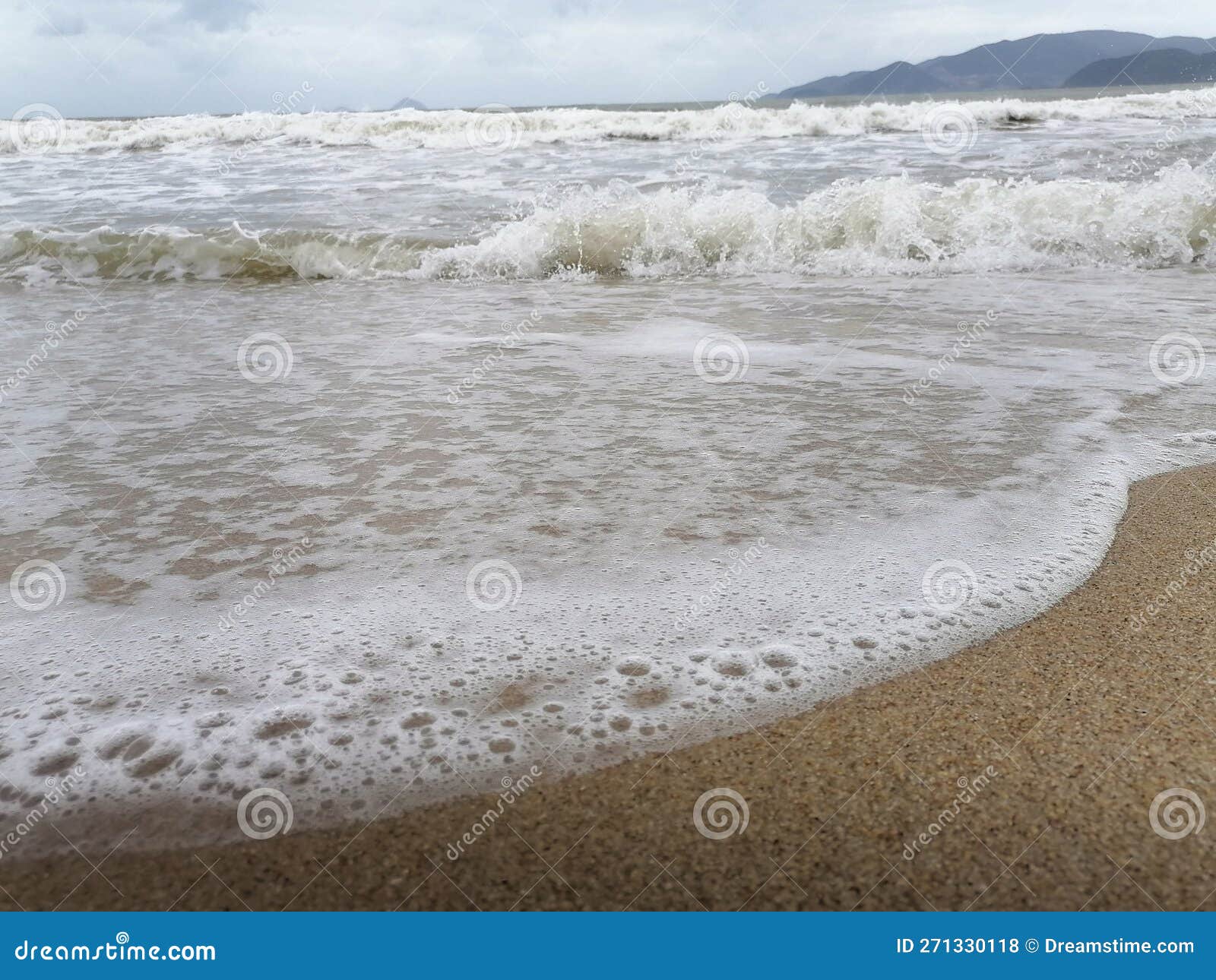White Waves Roll on the Seashore Stock Photo - Image of seashore, cloud ...