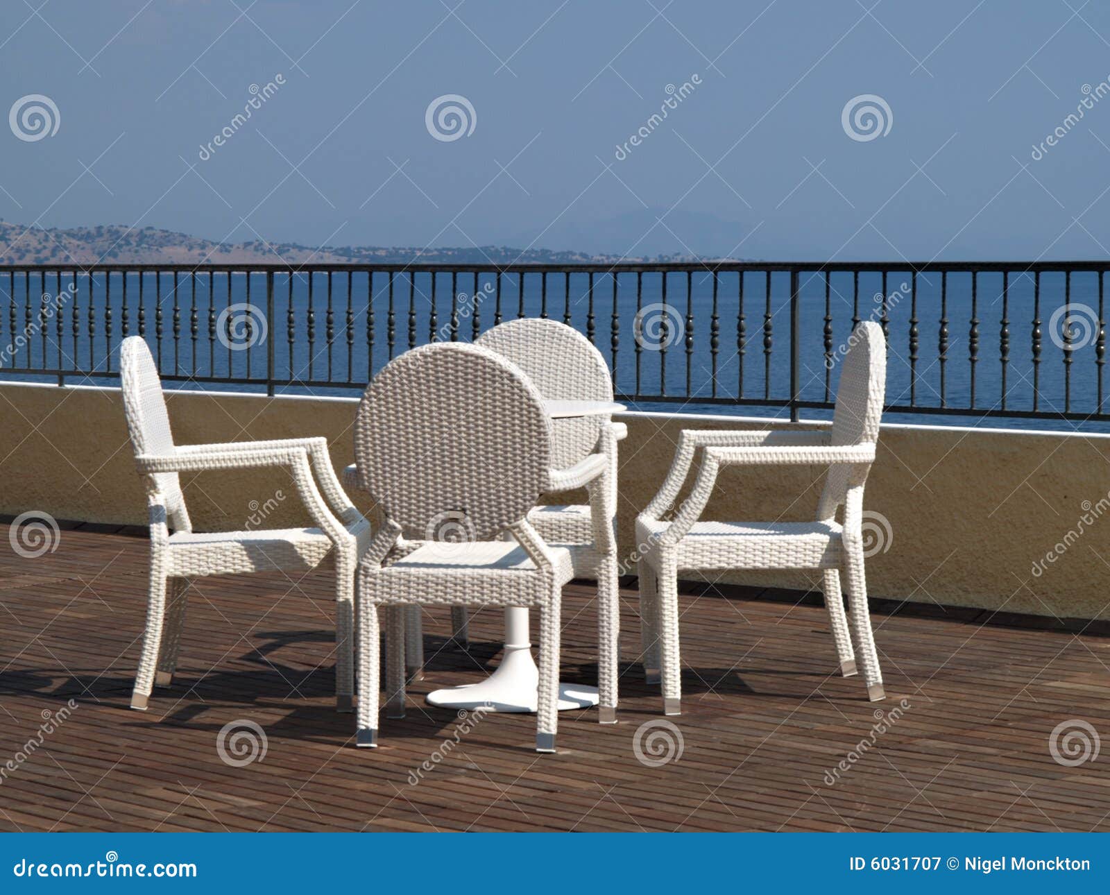 White Wicker Chairs on a Hotel Terrace Stock Image - Image of chair ...