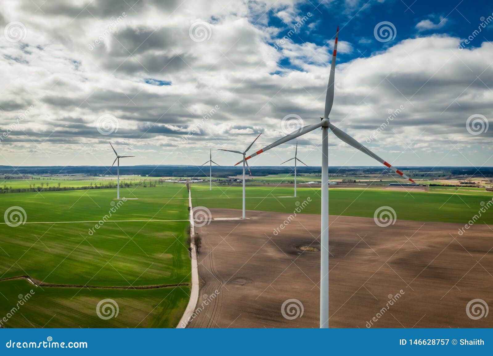 White Wind Turbines in a Brown Field, Aerial View Stock Image - Image ...