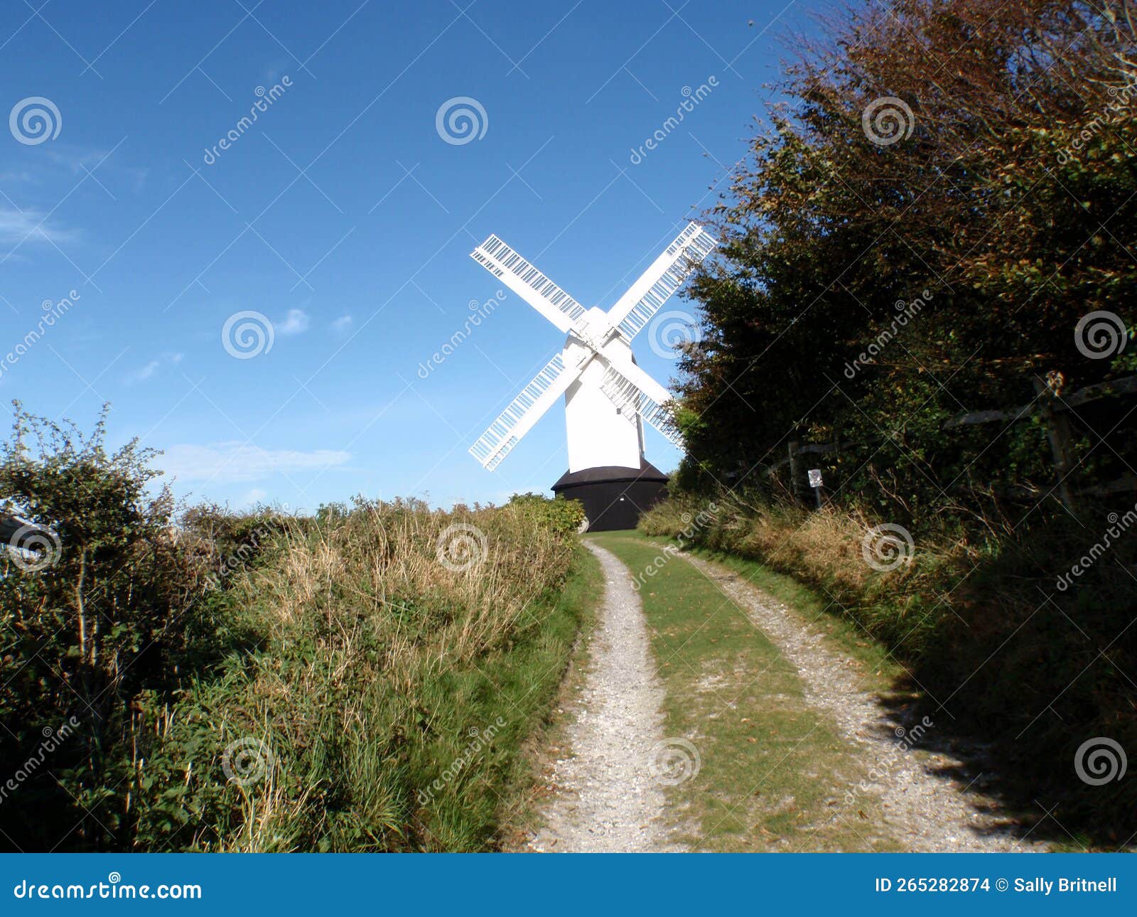 White windmill stock photo. Image of windmill, road - 265282874