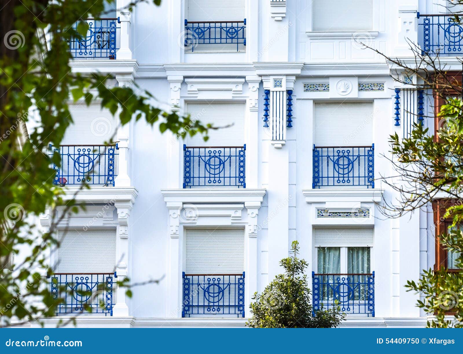 White Windows, Blue Railings Stock Photo - Image of blue, detail: 54409750