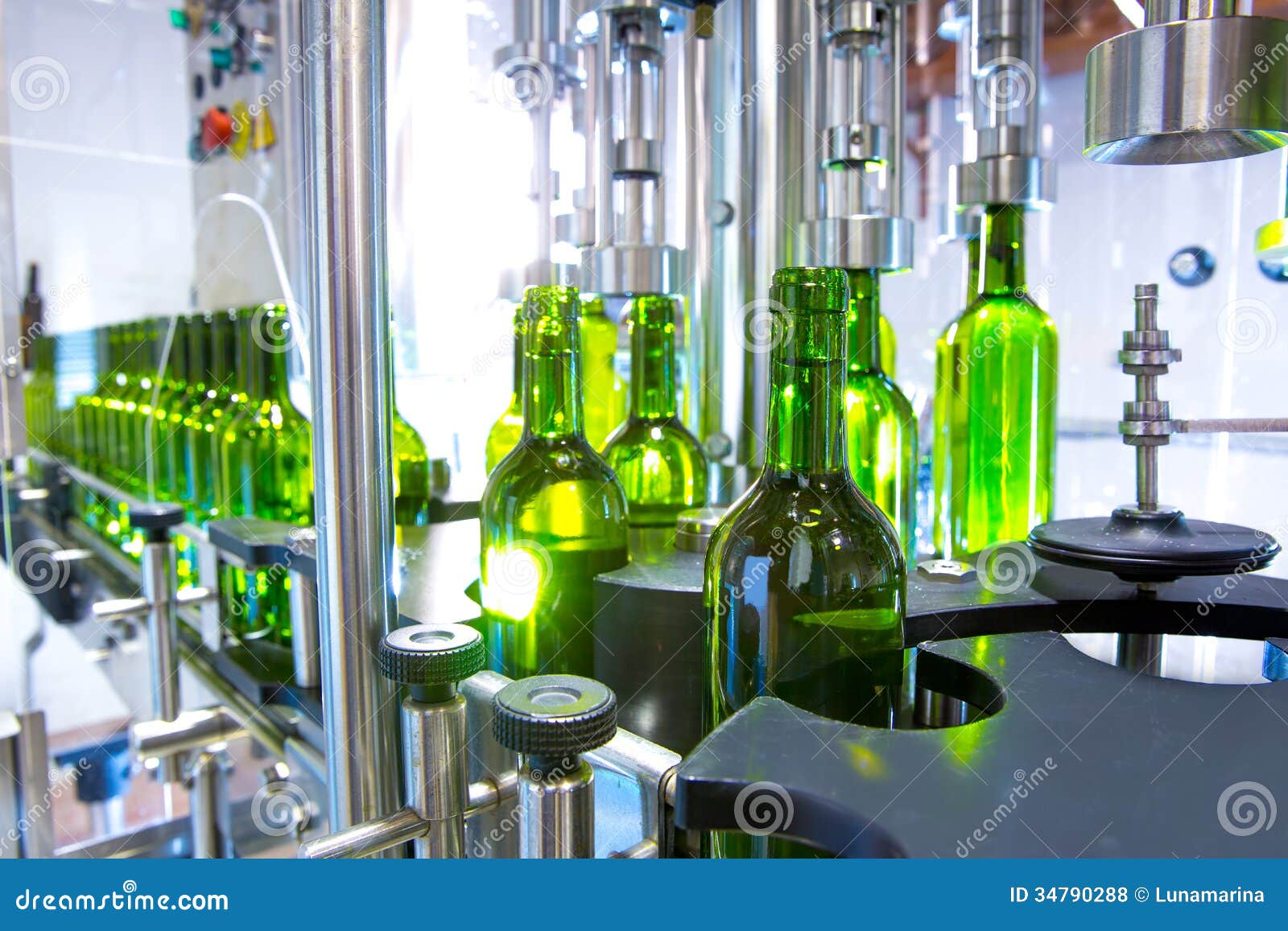 White Wine in Bottling Machine at Winery Stock Photo - Image of italy ...