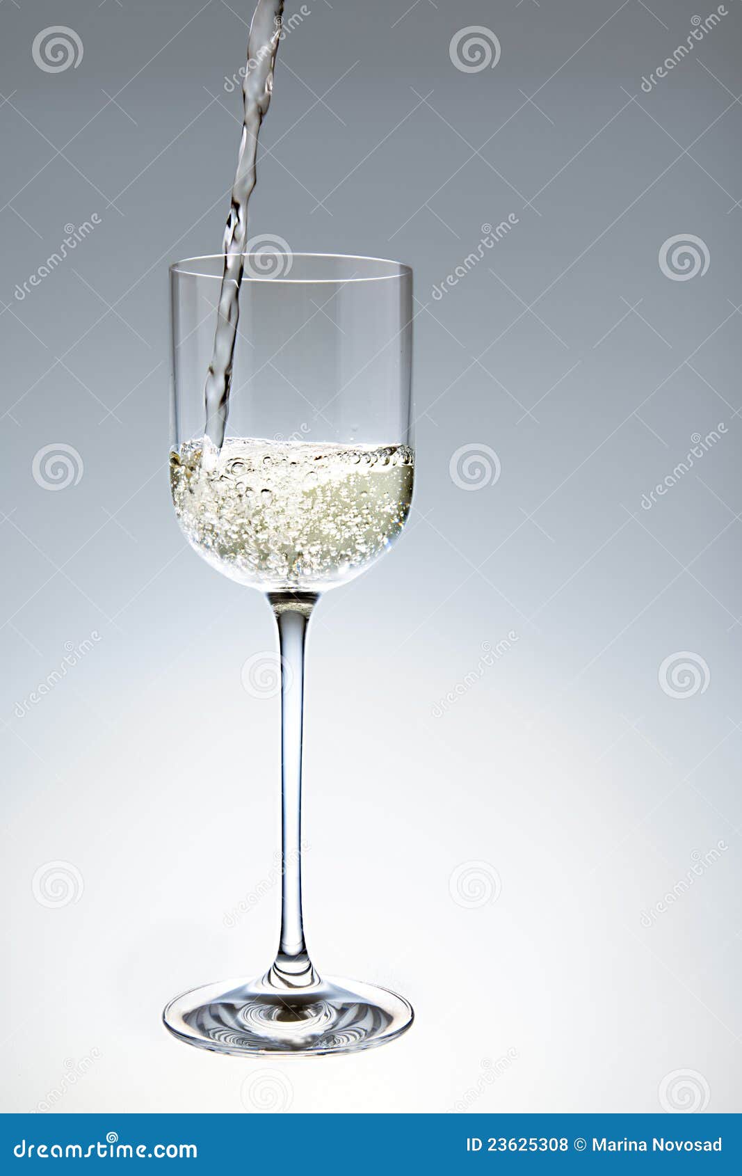 White Wine Poring into a Crystal Glass. Stock Photo - Image of ...