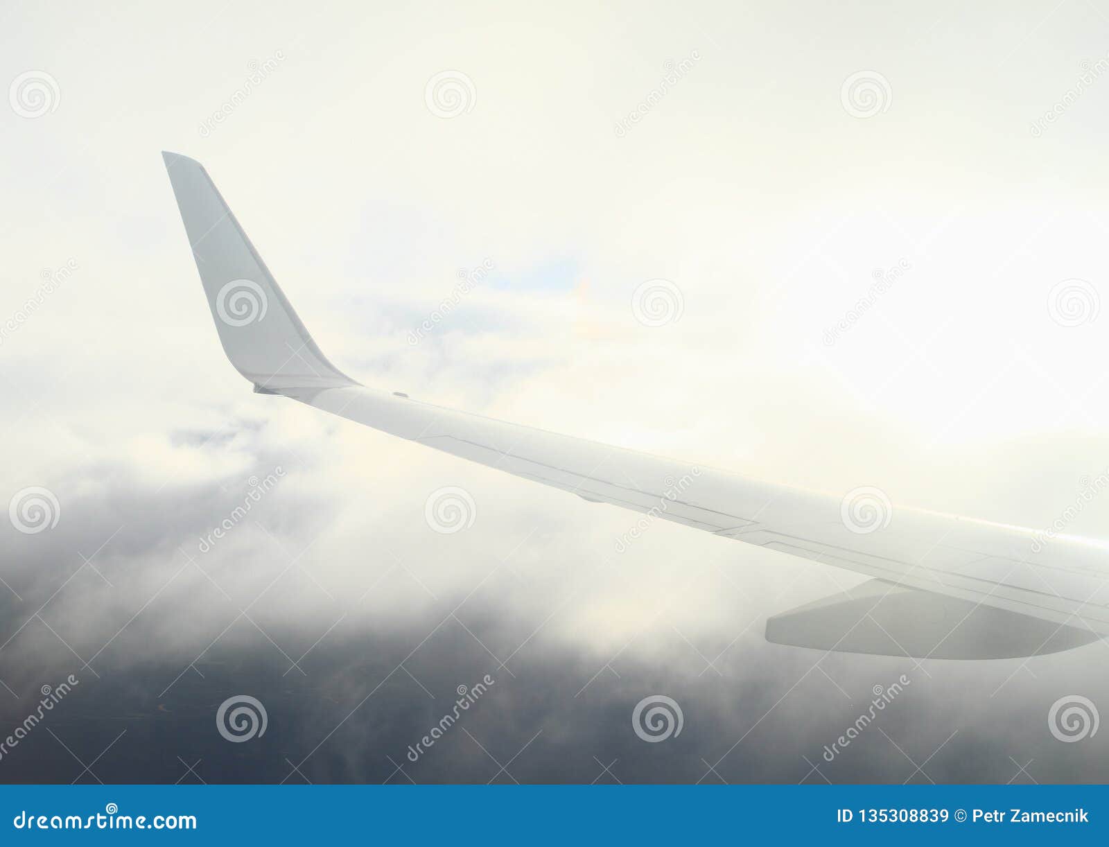 Wing of airplane stock image. Image of bright, flying - 135308839