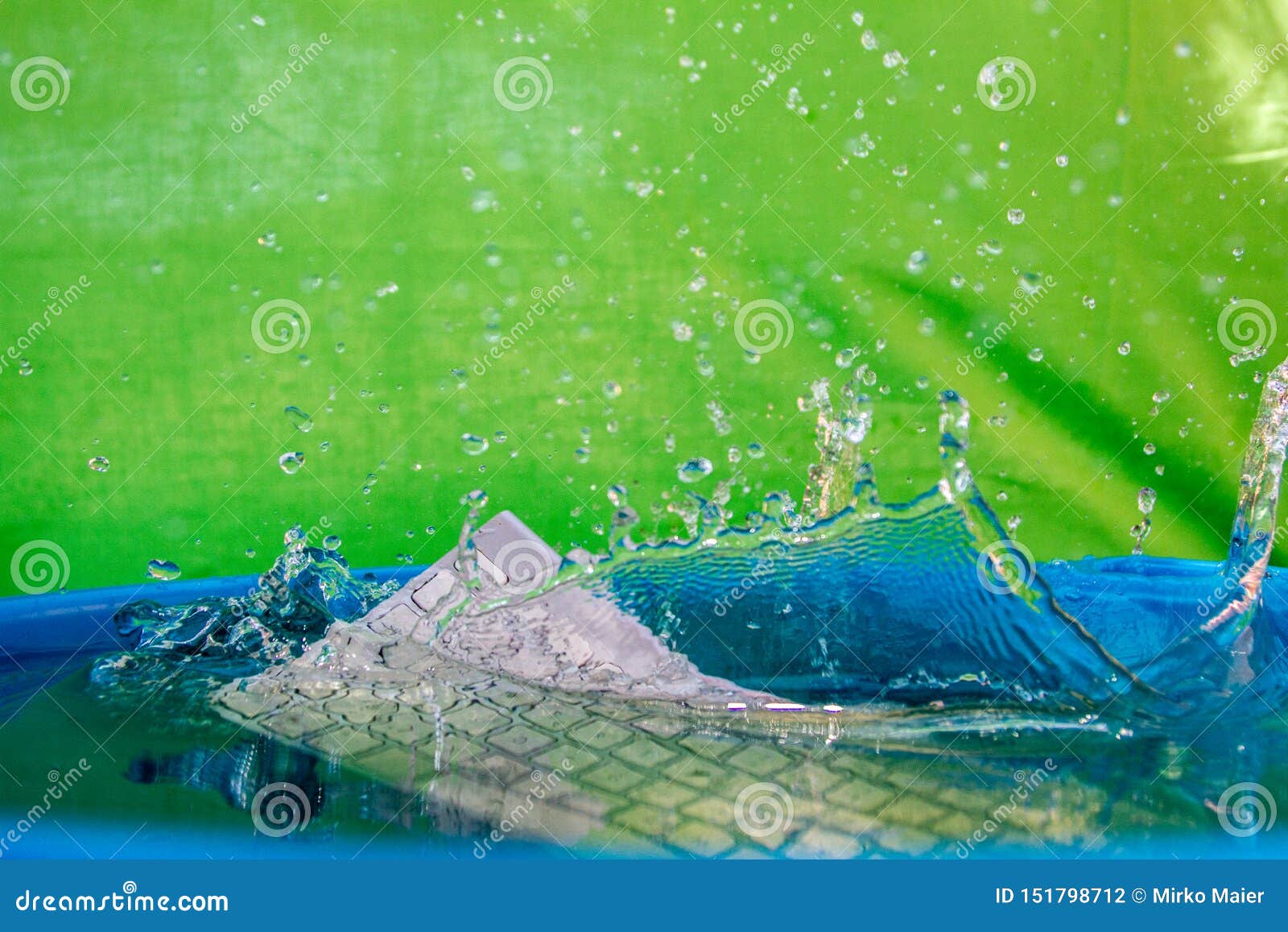 White Wireless Computer Keyboard Falling into the Water Spraying Stock ...