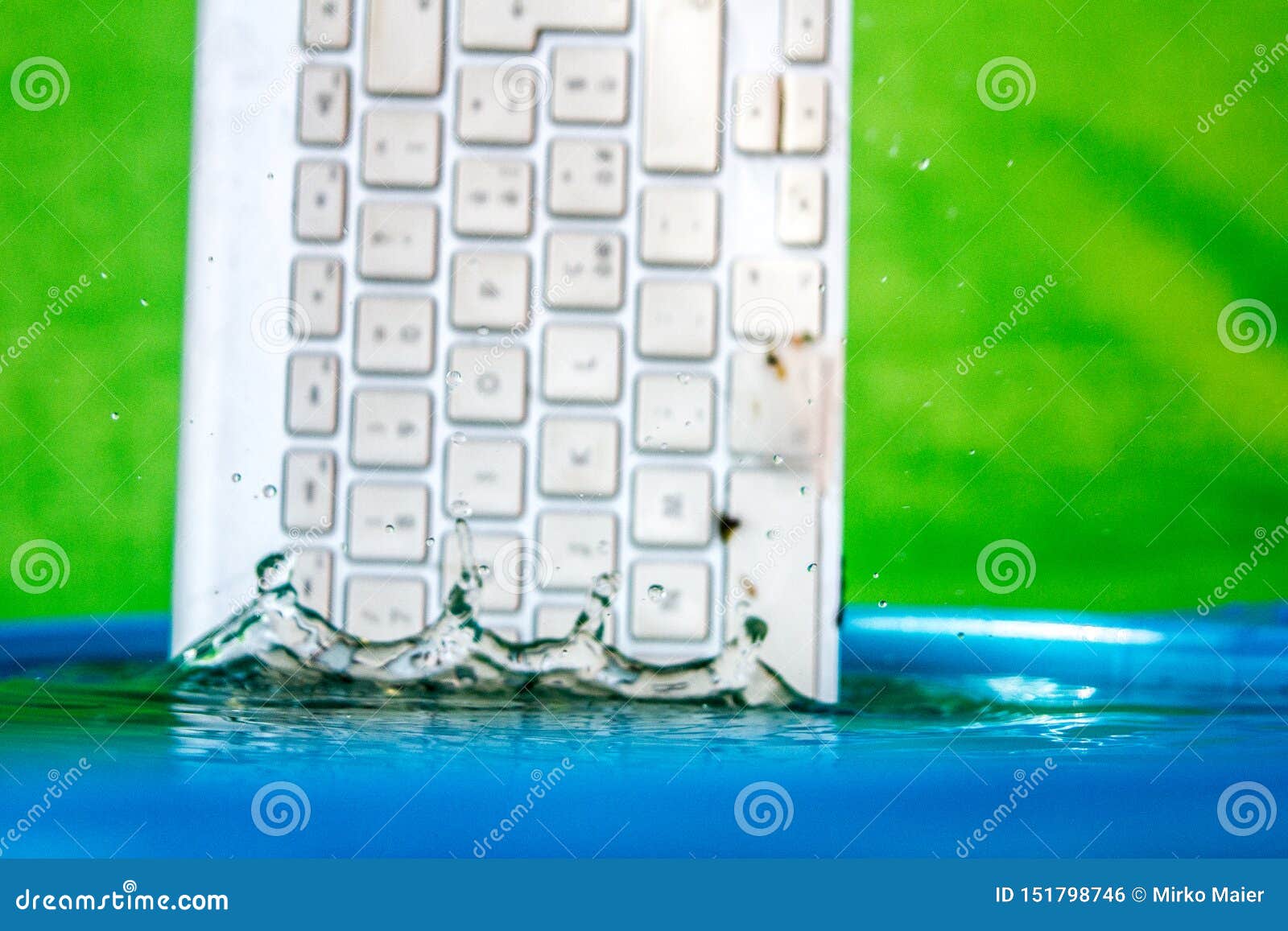 White Wireless Computer Keyboard Falling into the Water Spraying Stock ...