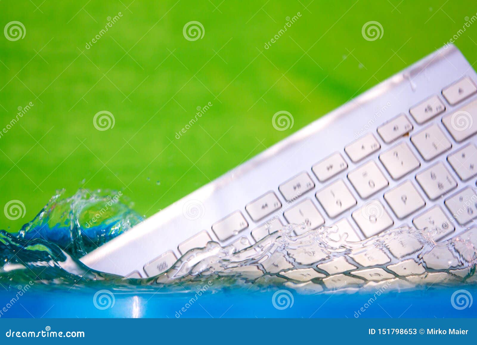 White Wireless Computer Keyboard Falling into the Water Spraying Stock ...