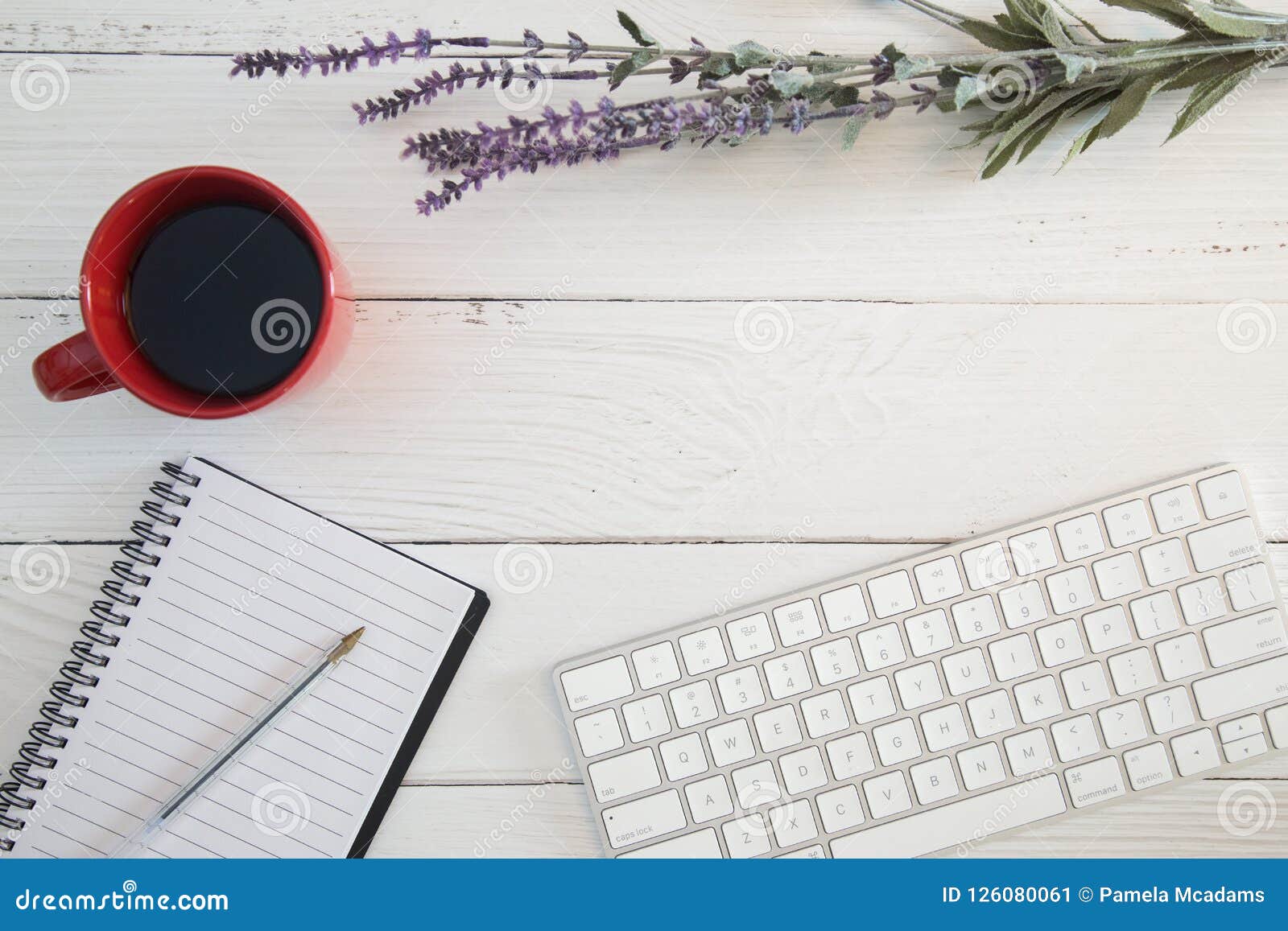 Computer and Notebook on a Table Editorial Photo - Image of notepad ...
