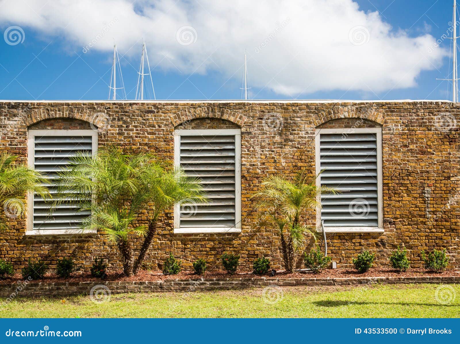 White Wood Slat Windows in Old Stone Wall Stock Photo - Image of wall ...