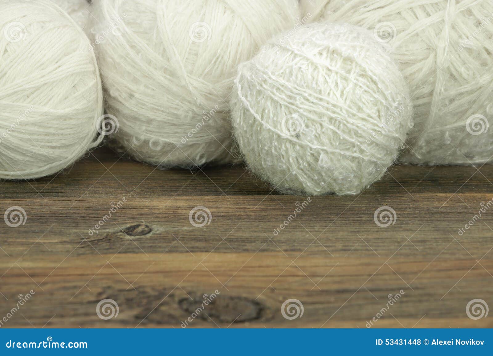 White Wool Rolls on Wood Background Stock Photo - Image of closeup ...