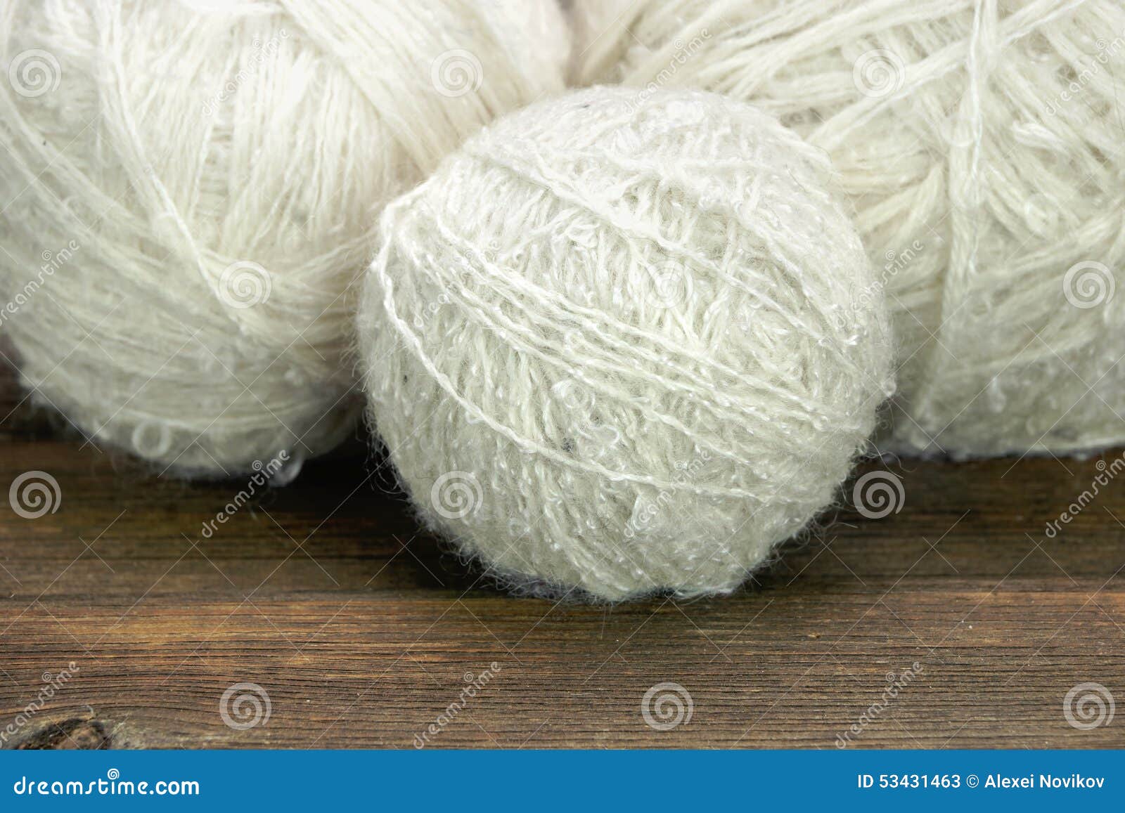 White Wool Rolls on Wood Background Stock Image - Image of fiber, group ...
