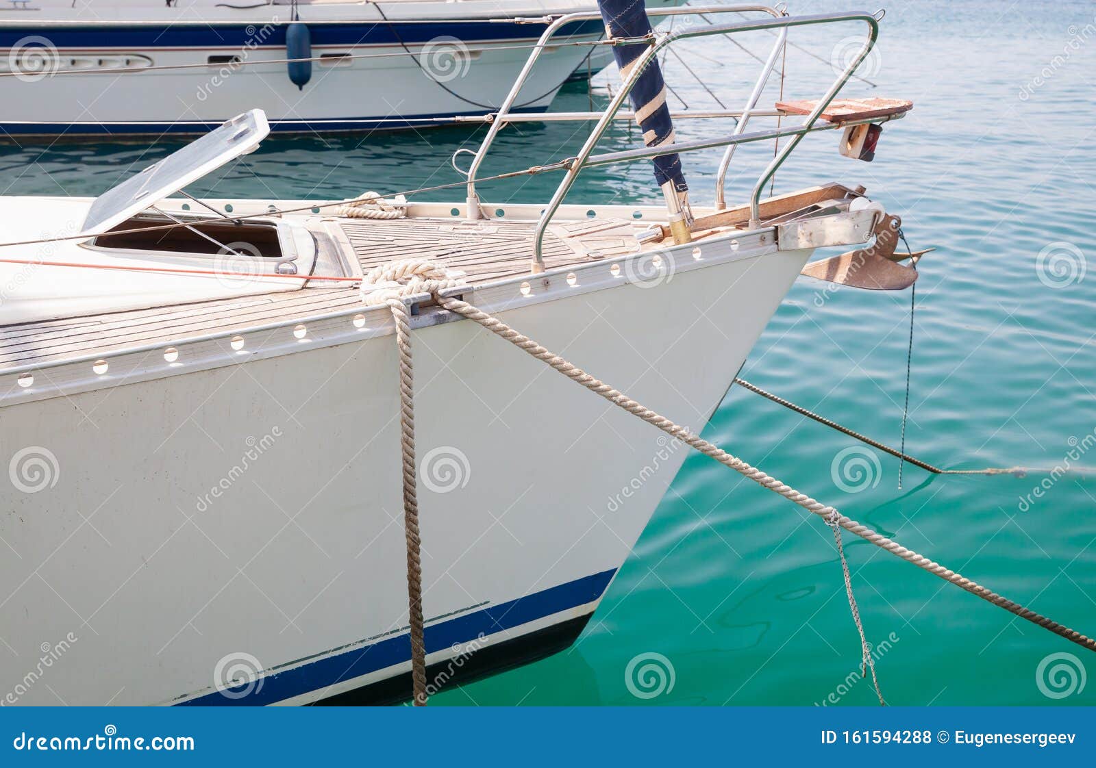 White Yacht Bow with Mooring Ropes Stock Photo - Image of blue ...