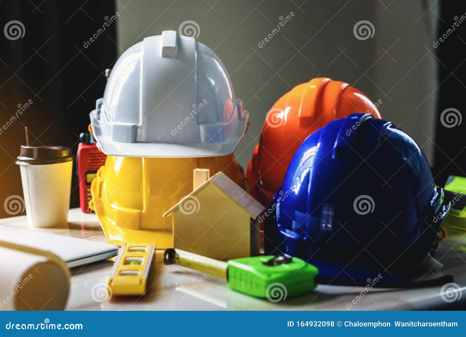 White, Yellow and Blue Safety Helmets for Workers` Safety Projects in ...