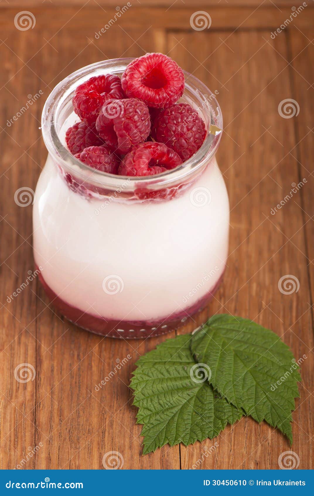 White Yogurt in a Glass Jar with Raspberry Stock Photo - Image of ...