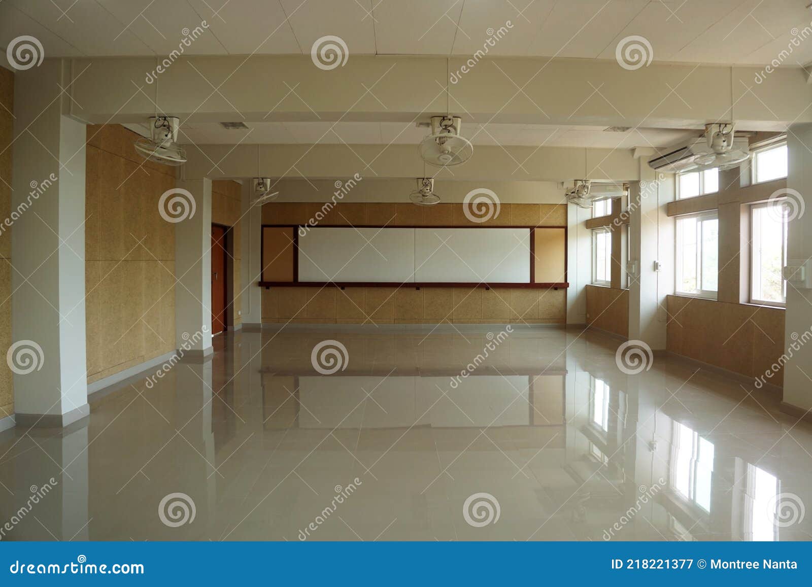A Whiteboard Mounted in Front of an Empty Classroom Stock Image - Image ...