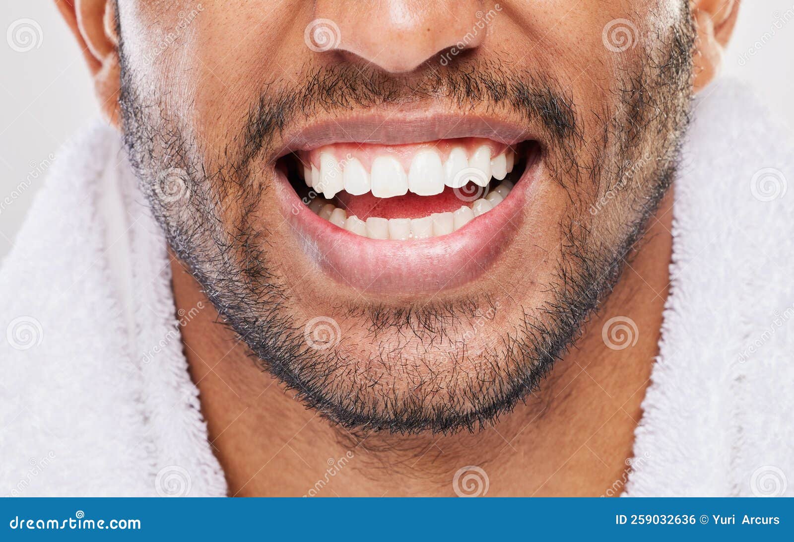 The Whitest Smile. an Unrecognizable Man Brushing His Teeth Against a ...