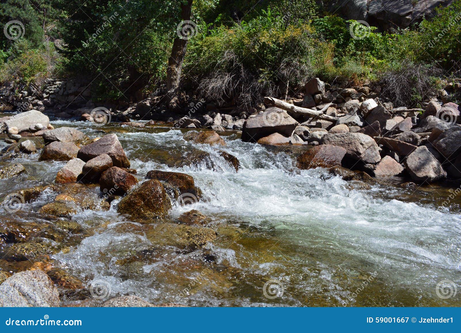 Whitewater Flows Over Rocks in the Mountains Stock Image - Image of ...