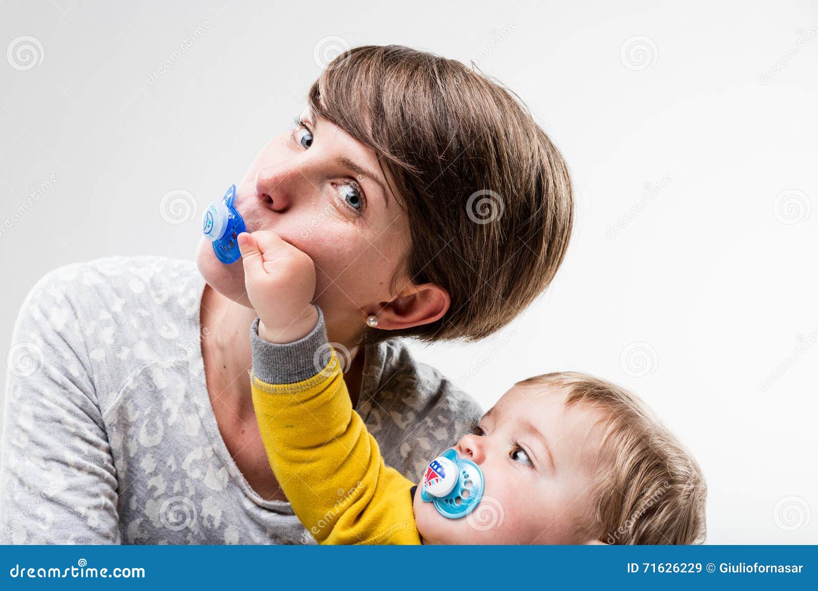 Who S this Pacifier is Mine or Yours Stock Image - Image of italian ...
