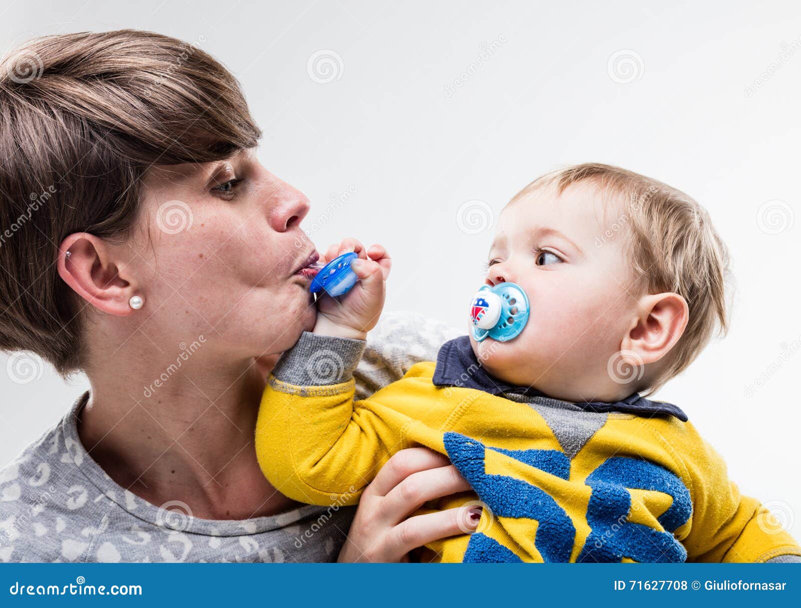 Who S this Pacifier is Mine or Yours Stock Photo - Image of eyes, play ...