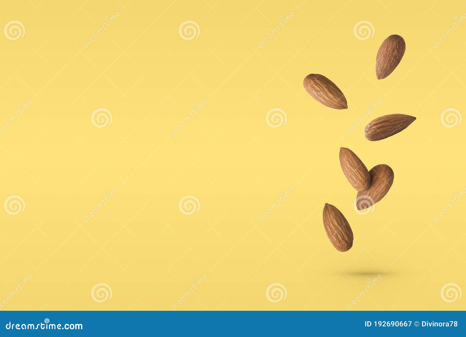 Whole Almonds Falling Yellow Background. Stock Image - Image of ...