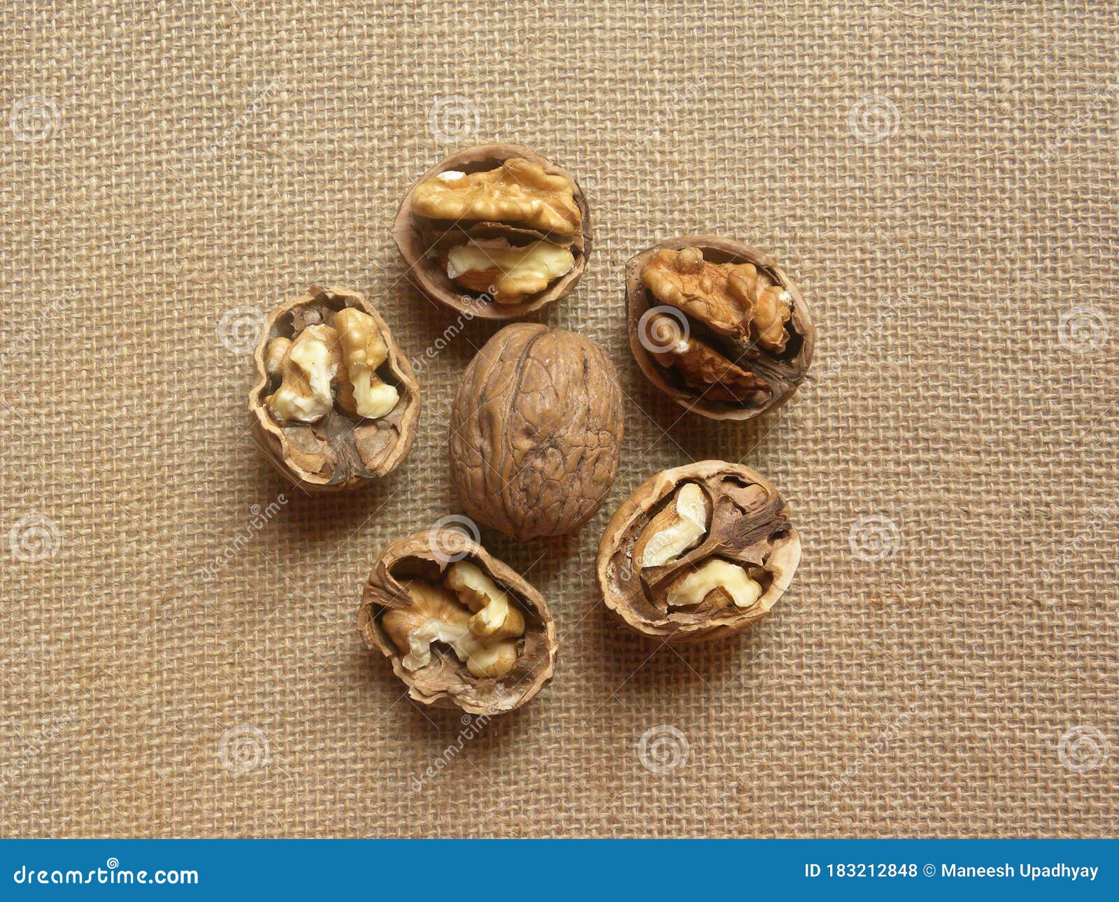 Whole and broken Walnuts stock photo. Image of husks - 183212848