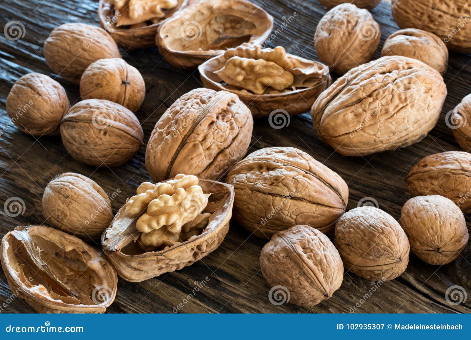 Whole and Broken Walnuts on Old Wood Stock Image - Image of seed, macro ...