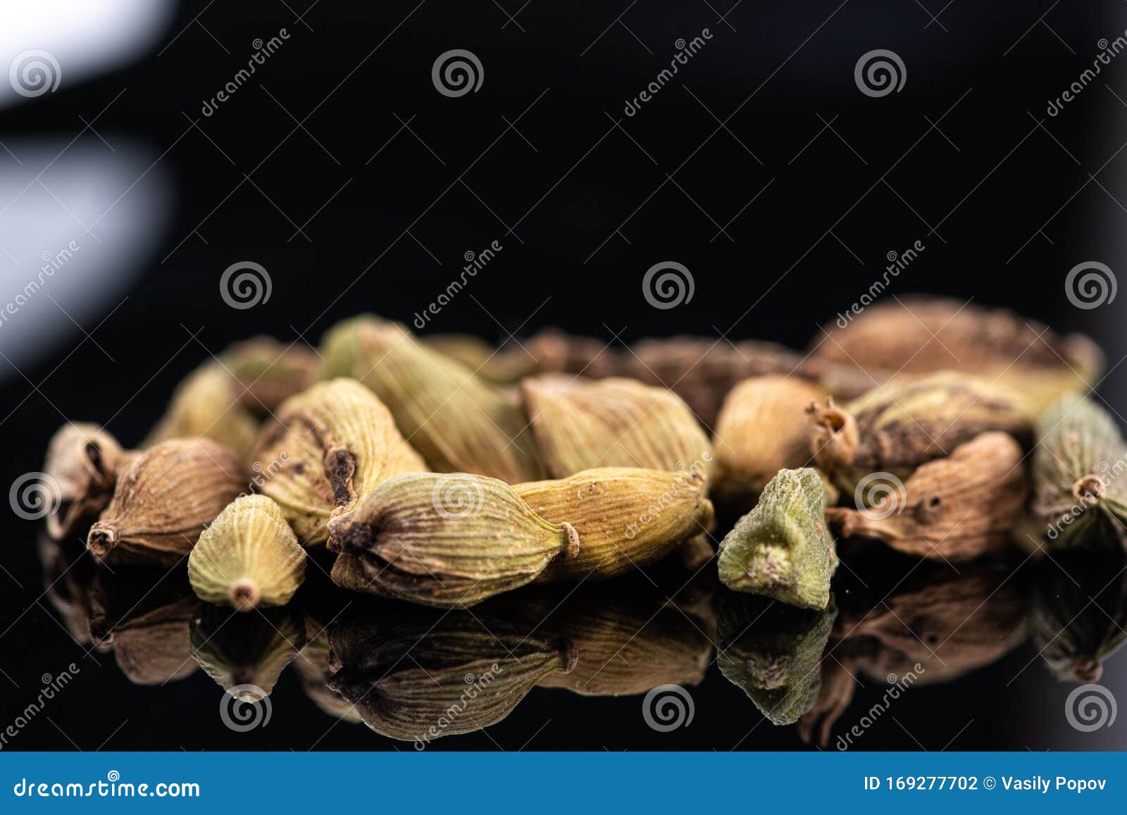 Whole Cardamom and Broken Next To Test Tube and Cork Stock Photo ...