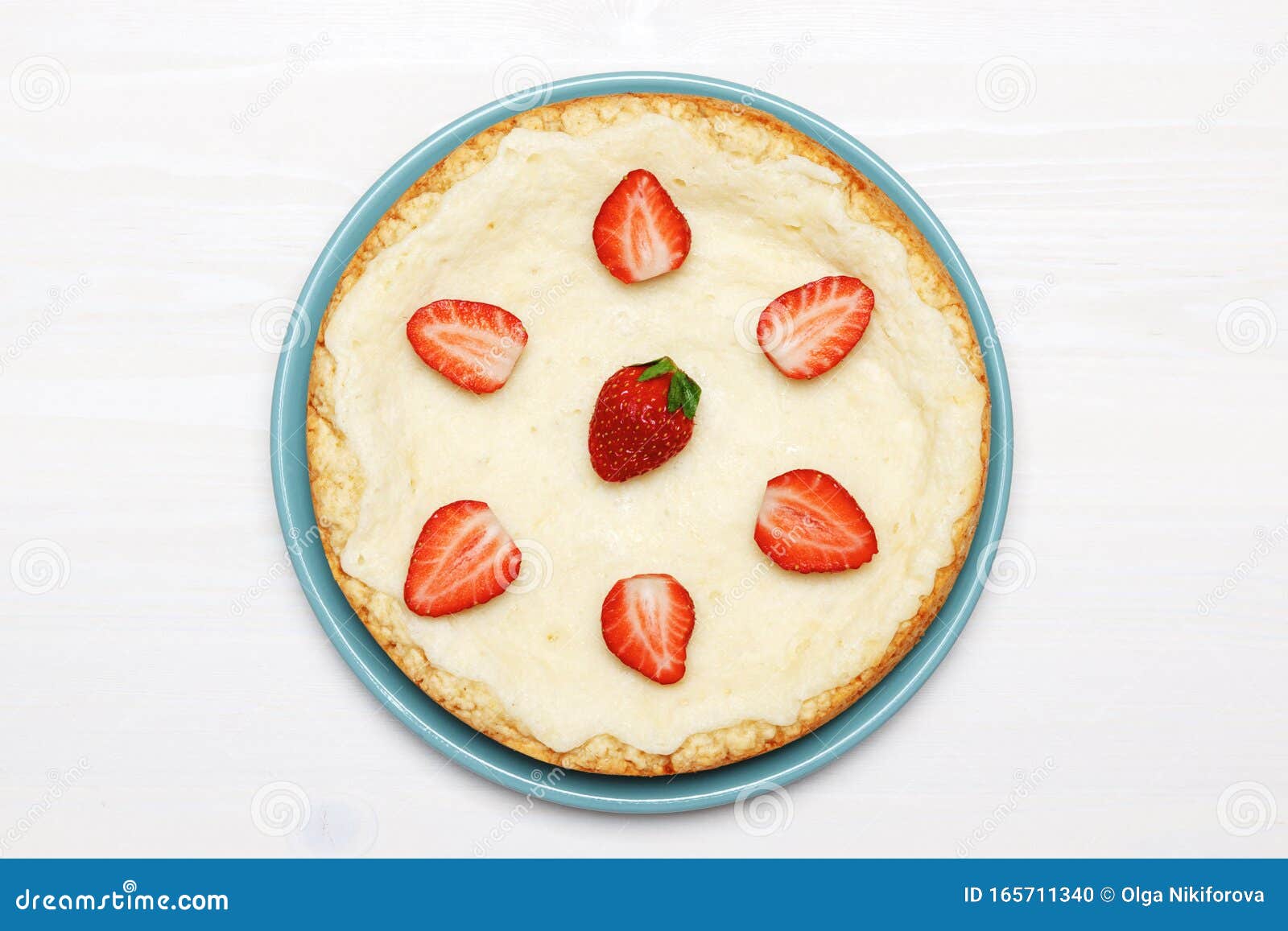 A Whole Classic Cheesecake with Strawberries on a White Background. Top ...