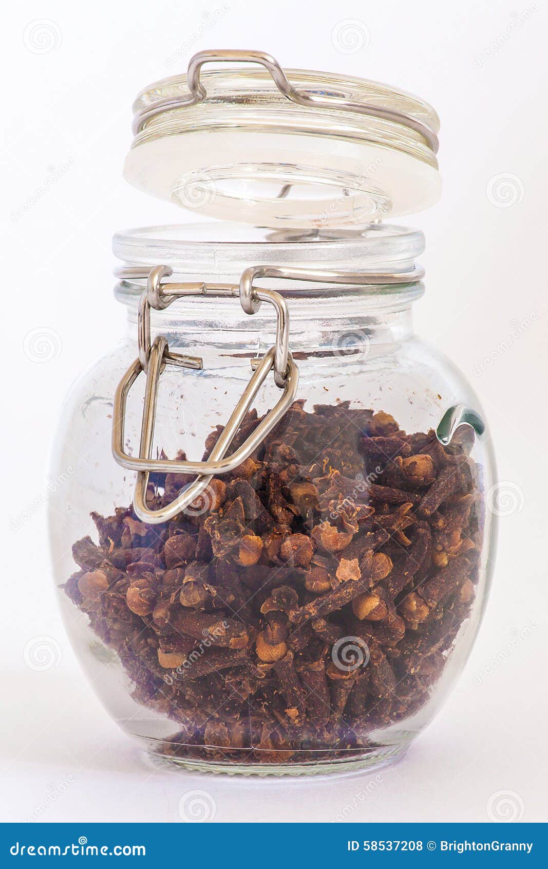 Whole cloves in jar stock photo. Image of stalk, buds - 58537208
