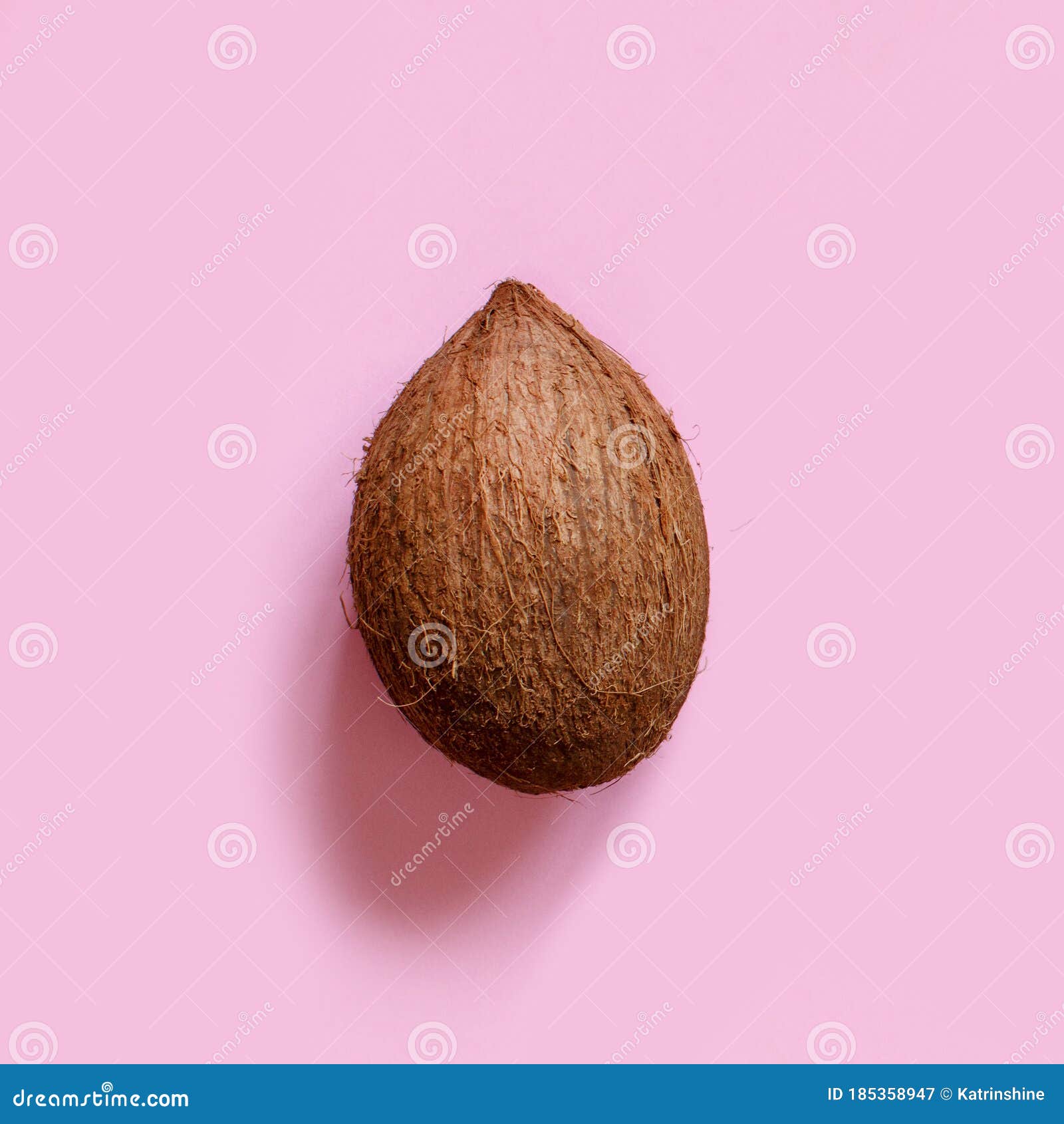 Whole Coconut on a Light Pink Background Top View Stock Image - Image ...