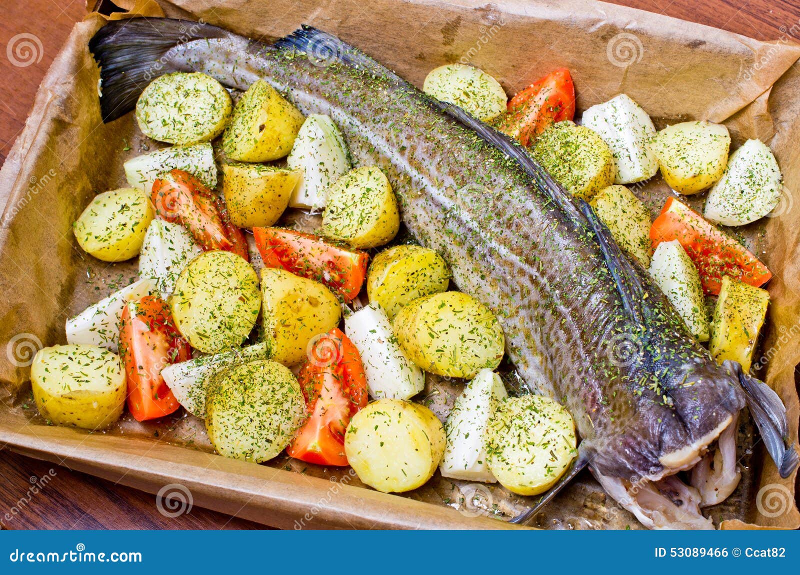 Whole cod with vegetables stock photo. Image of delicious - 53089466